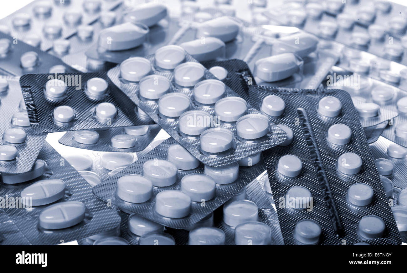 Blisters pills on blue hi-res stock photography and images - Alamy