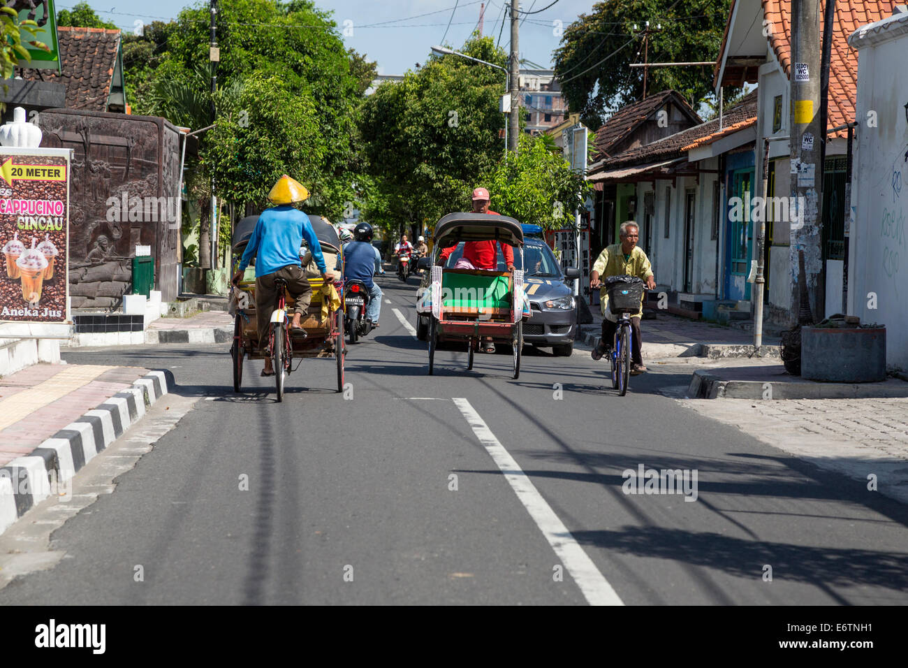 Yogyakarta, Java, Indonesia. Street Scene, with Two Becaks (Man-powered ...