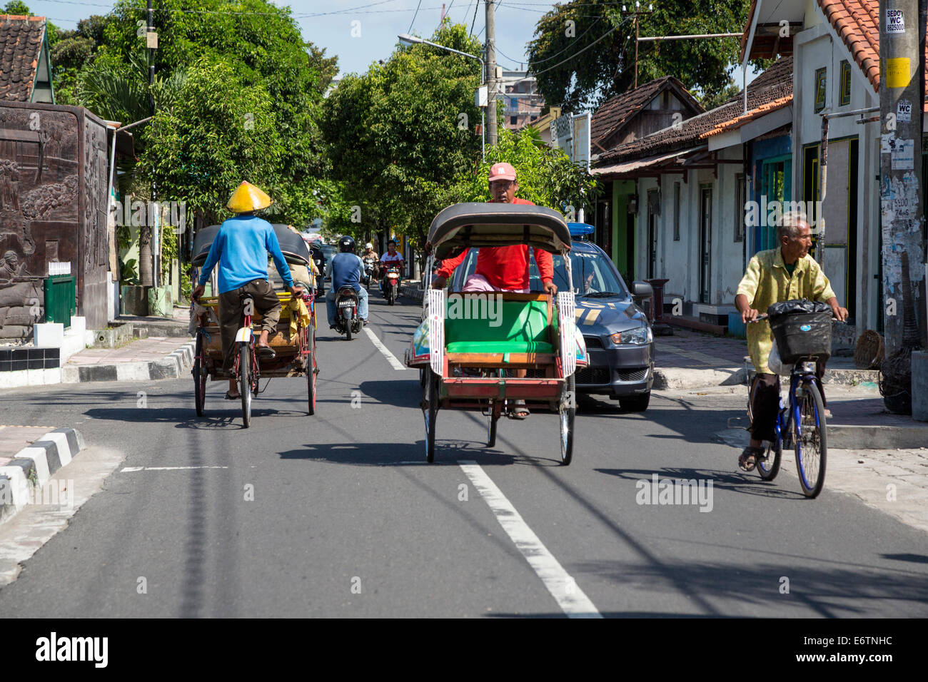 Yogyakarta, Java, Indonesia. Street Scene, with Two Becaks (Man-powered ...