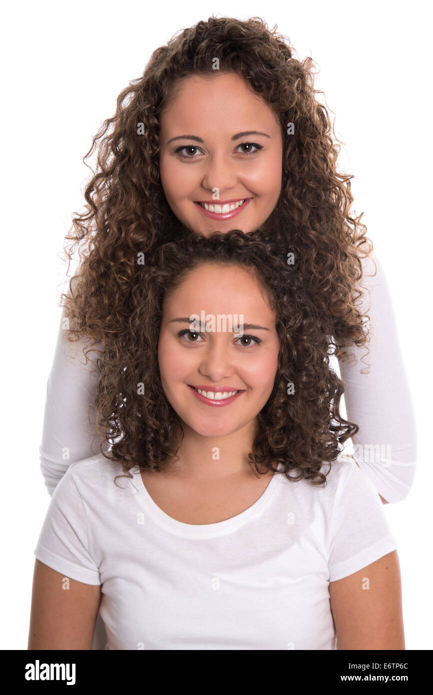 Real monozygotic twins with natural stop curls isolated over white ...