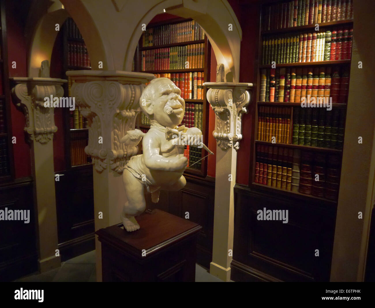 Cute cupidon sculpture in museum in europe Stock Photo - Alamy