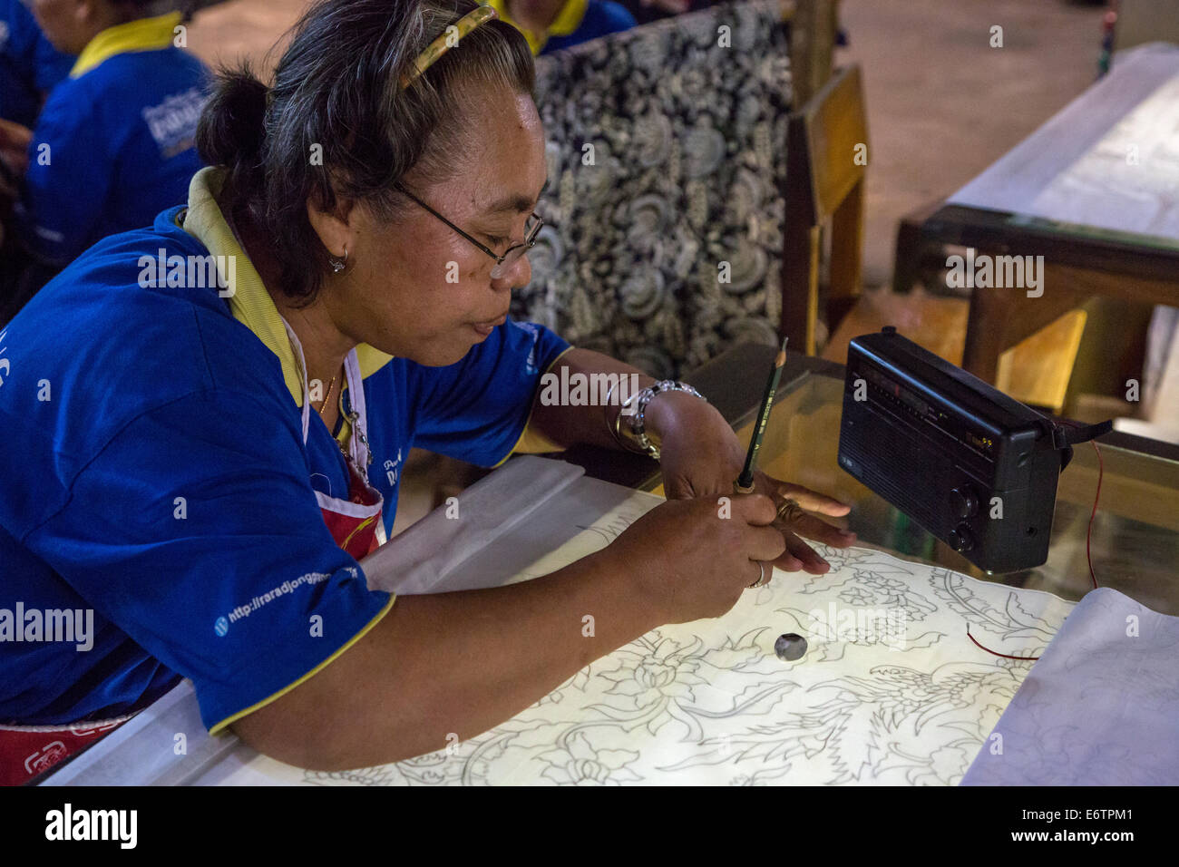 Yogyakarta, Java, Indonesia. Woman Drawing Design on Pattern for Batiks ...