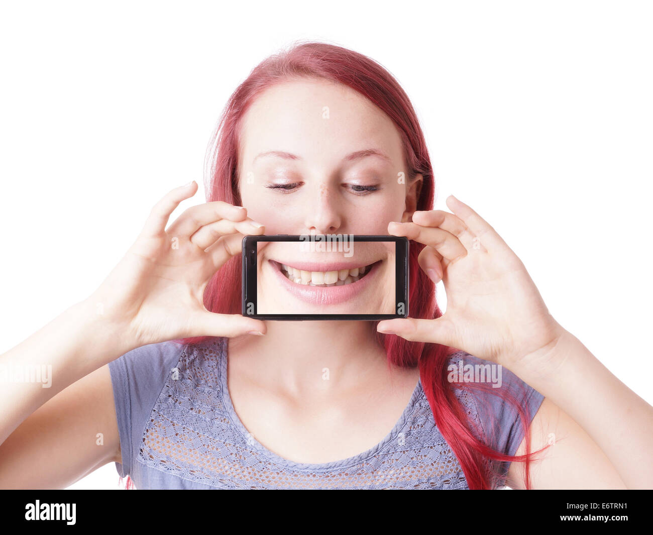 young woman messing around with camera phone Stock Photo - Alamy