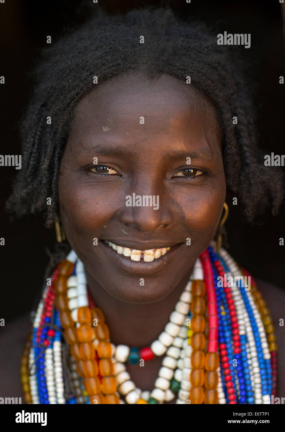 Portrait Of Beautiful Erbore Tribe Woman Wearing Beaded Necklace, Omo ...