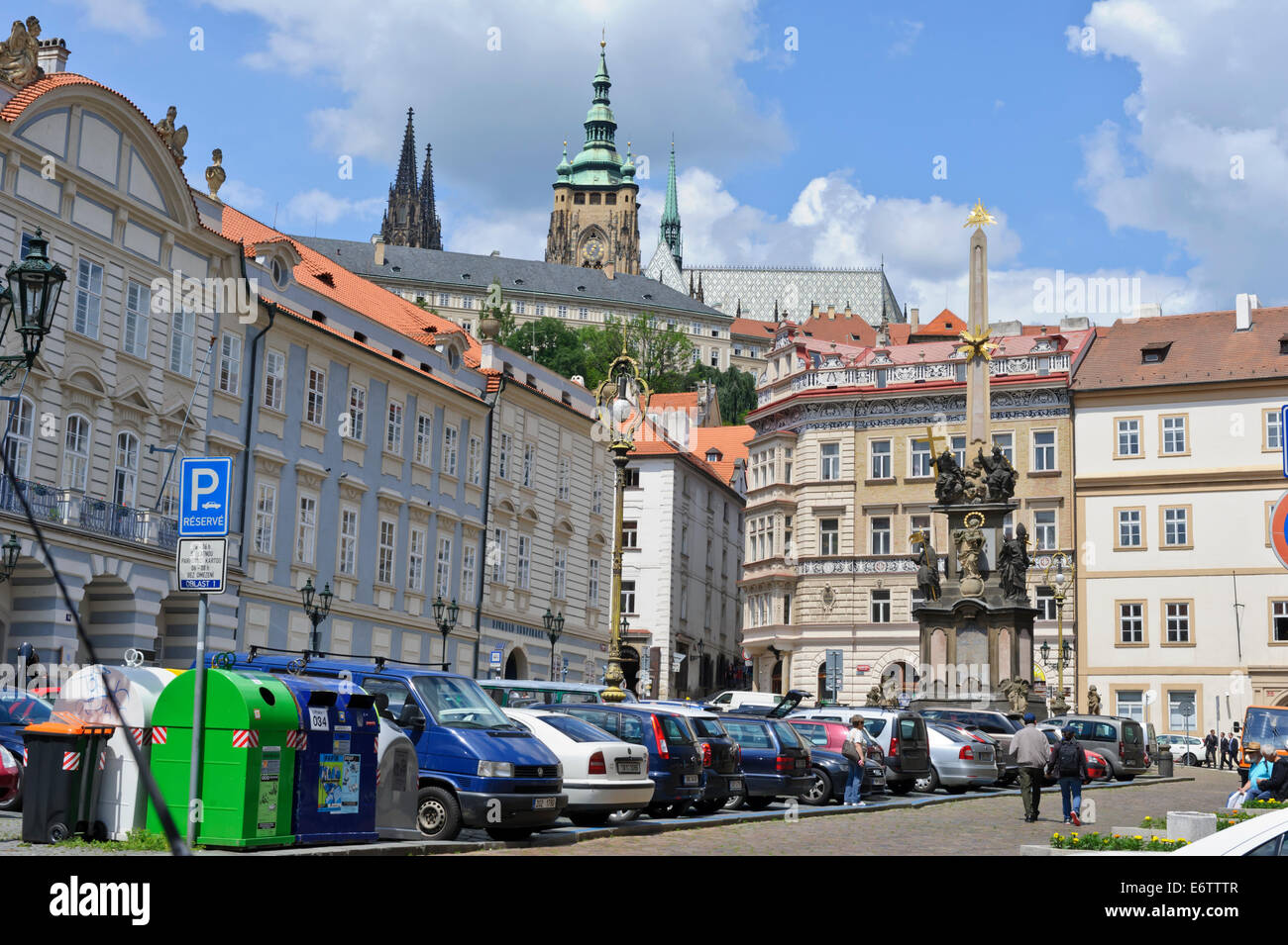 A baroque column of Holy Trinity with religious figures near St ...