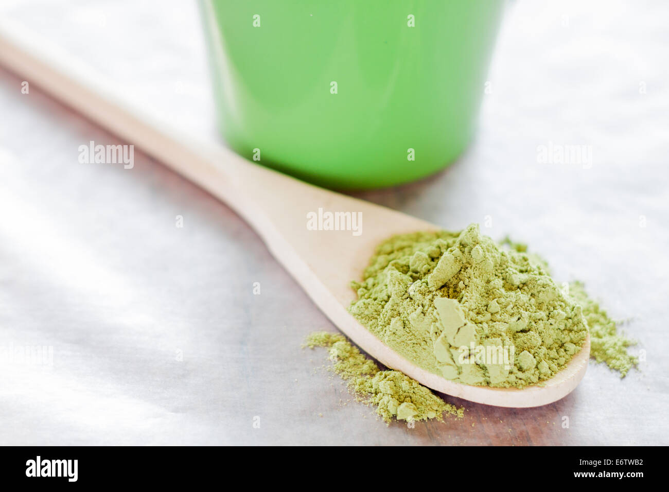 Powdered green tea with wooden spoon, stock photo Stock Photo - Alamy