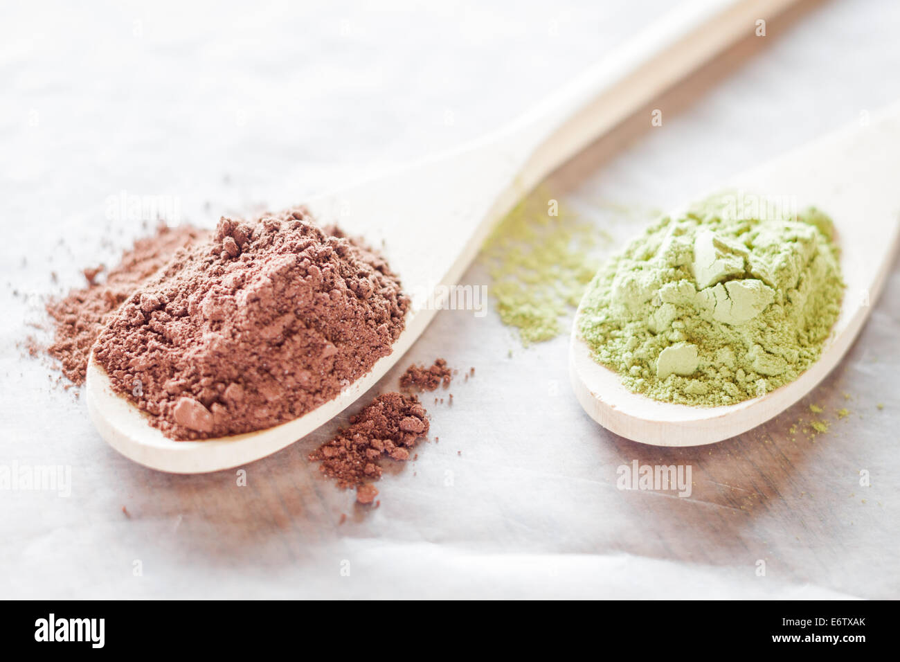Spoon of cocoa and green tea powder, stock photo Stock Photo - Alamy