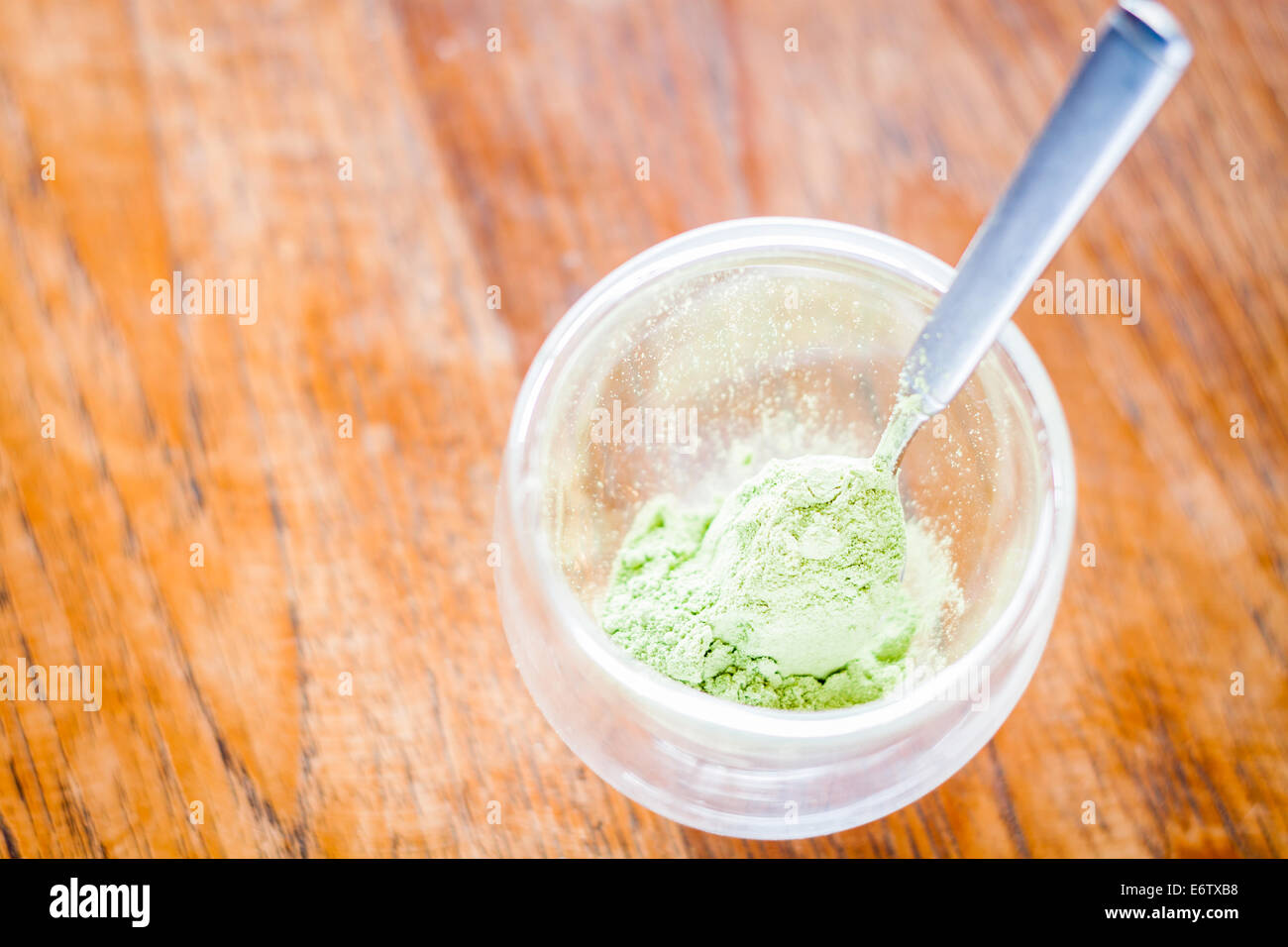 Spoon of green tea powder up close hi-res stock photography and images ...