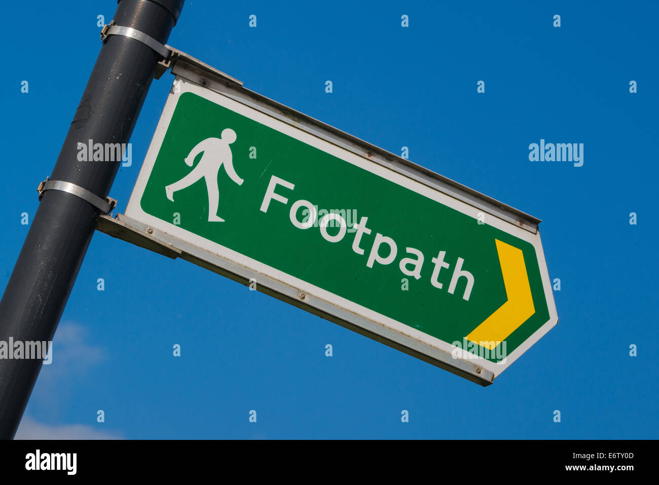 Signage indicating a footpath in a rural area of the United Kingdom ...