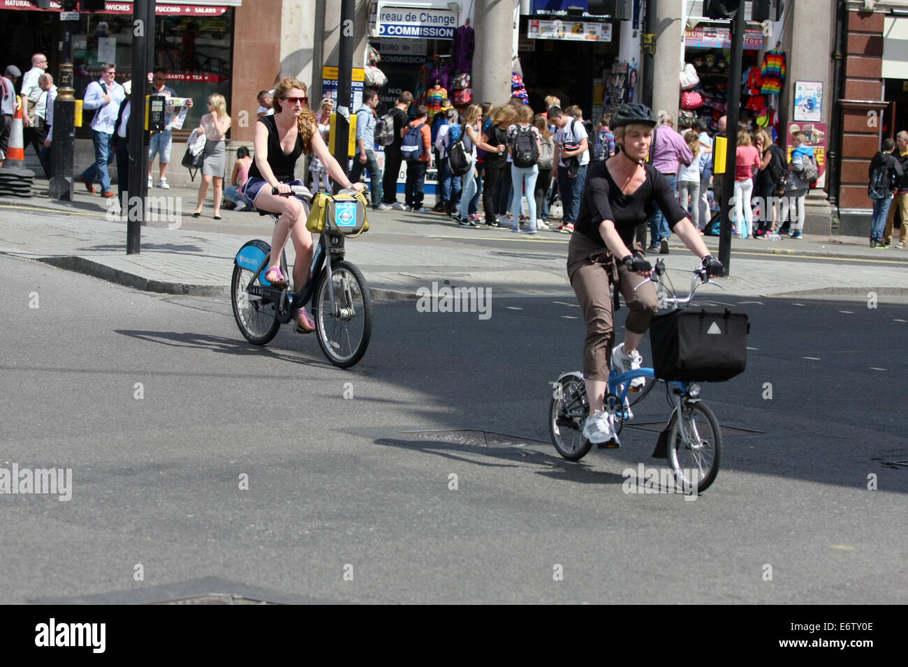 Two girls on bikes hi-res stock photography and images - Alamy