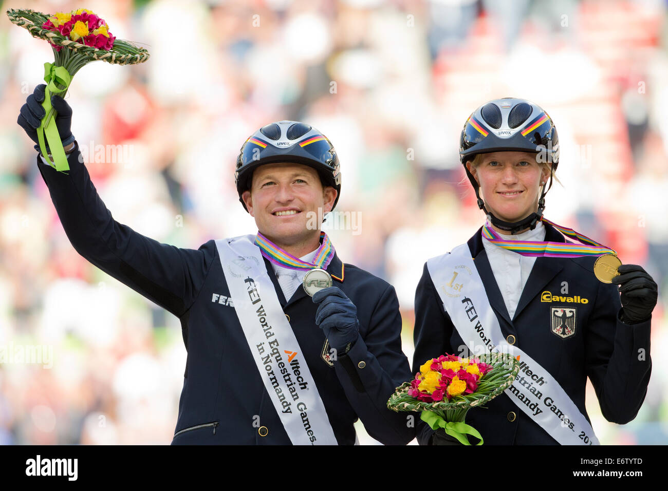Caen, France. 31st Aug, 2014. German riders Sandra Auffarth and Michael ...