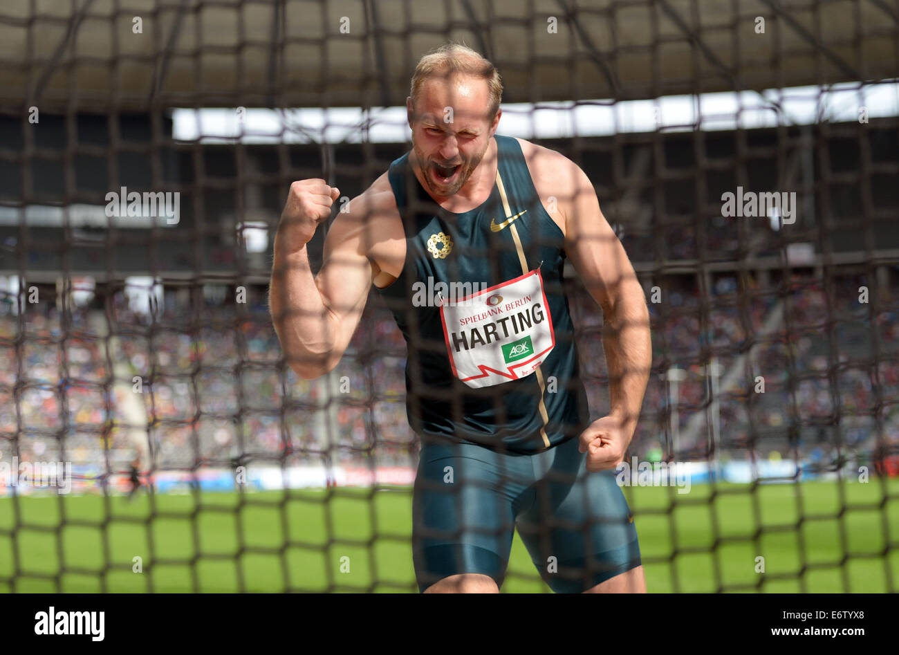 Berlin, Germany. 31st Aug, 2014. Discus thrower Robert Harting cheers ...