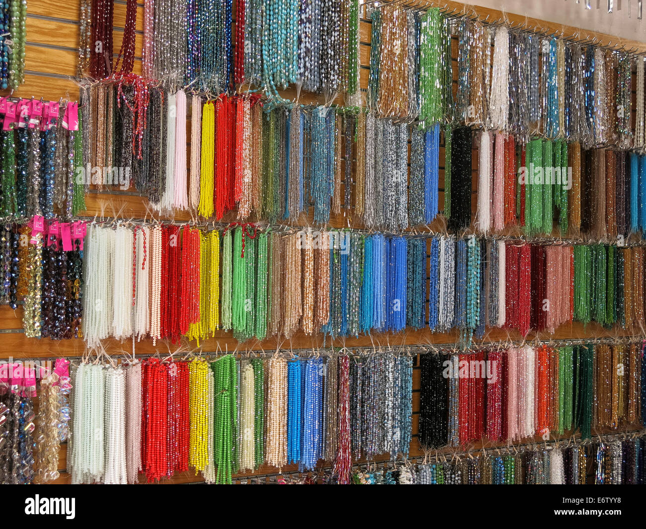 Strands of Beads Hanging in Shop, USA Stock Photo - Alamy