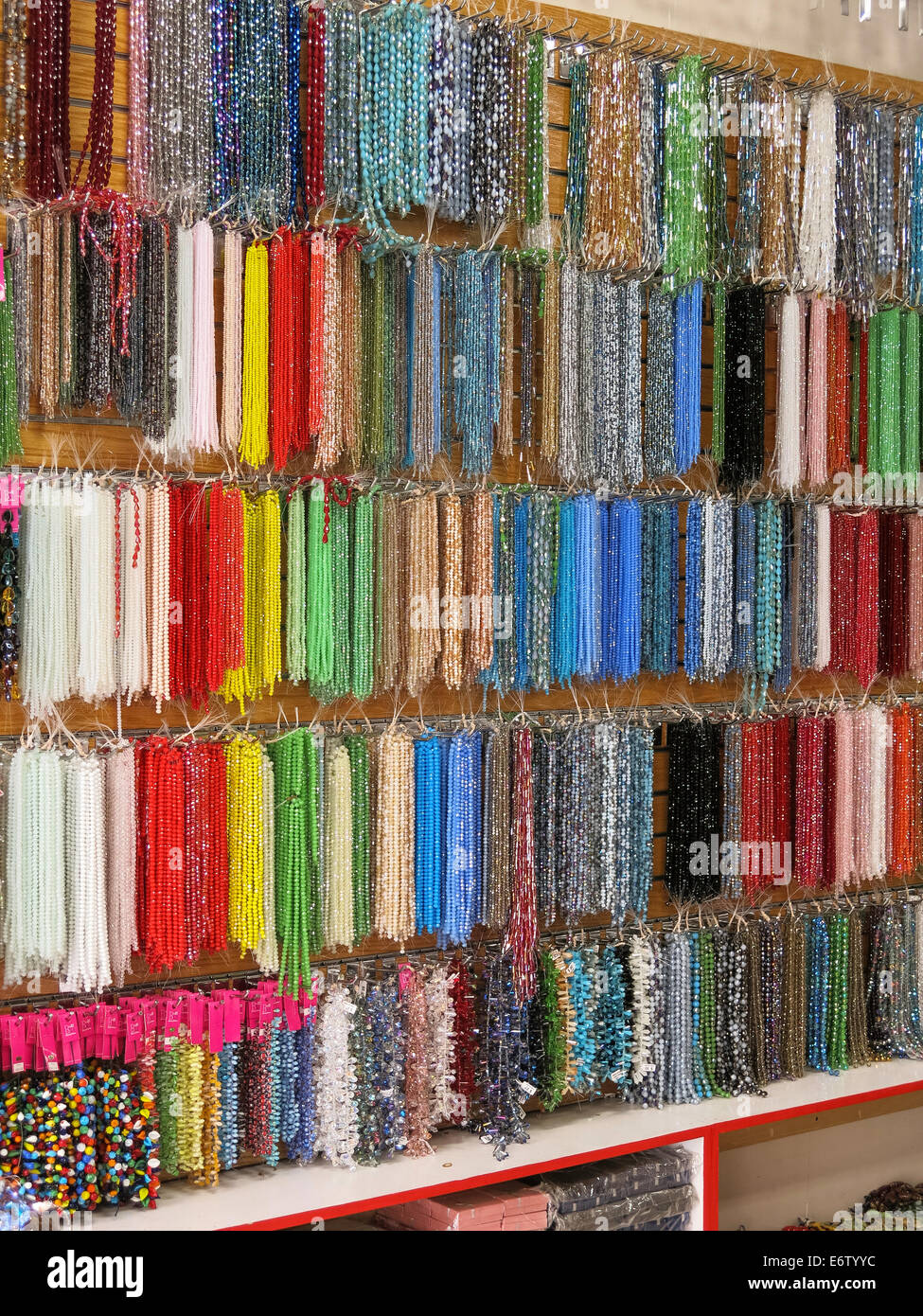 Strands of Beads Hanging in Shop, USA Stock Photo - Alamy