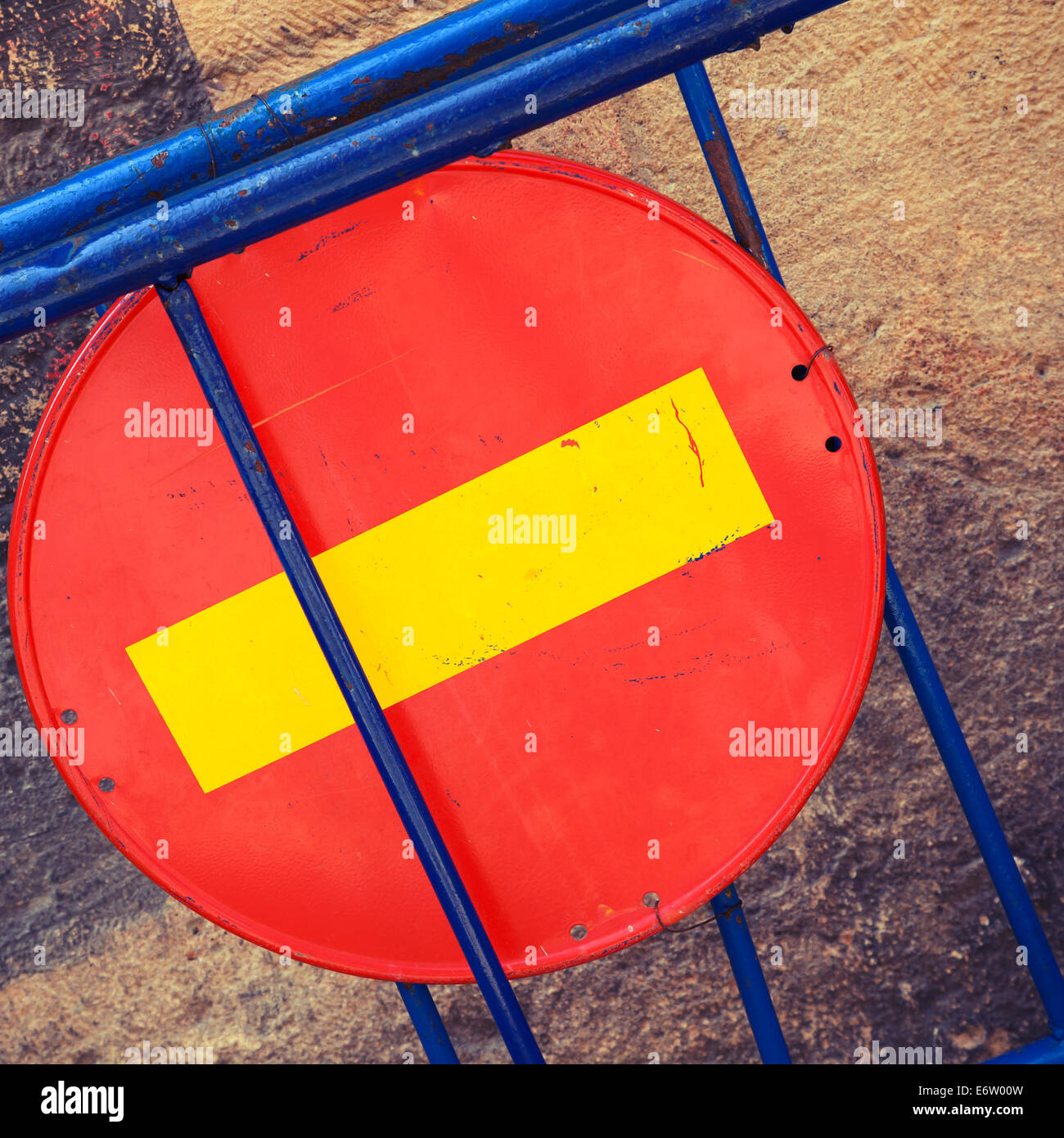 Round red sign No Entry mounted on blue road barrier Stock Photo - Alamy