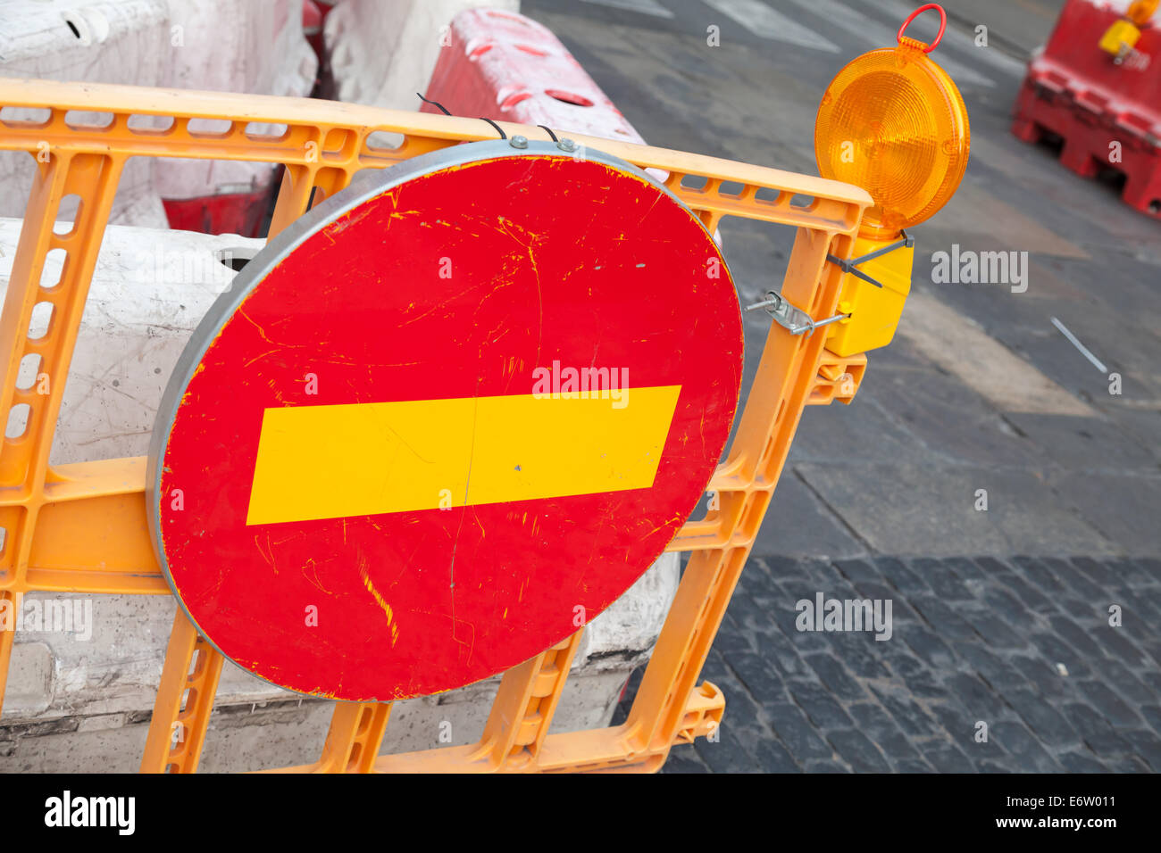 Round red sign No Entry mounted on the road barrier Stock Photo - Alamy