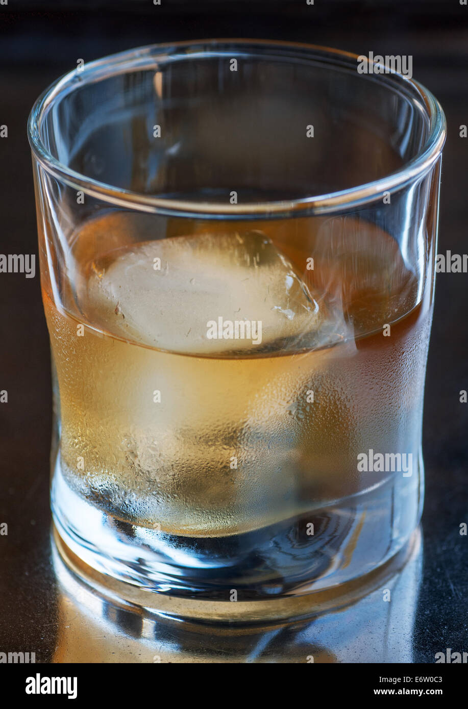 Glass of delicious aged single malt scotch on the rocks Stock Photo - Alamy