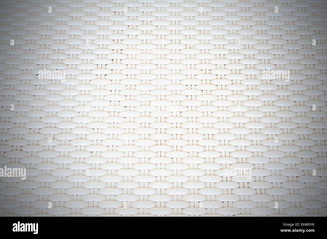 White cream plastic surface with repeating pattern. For use as ...