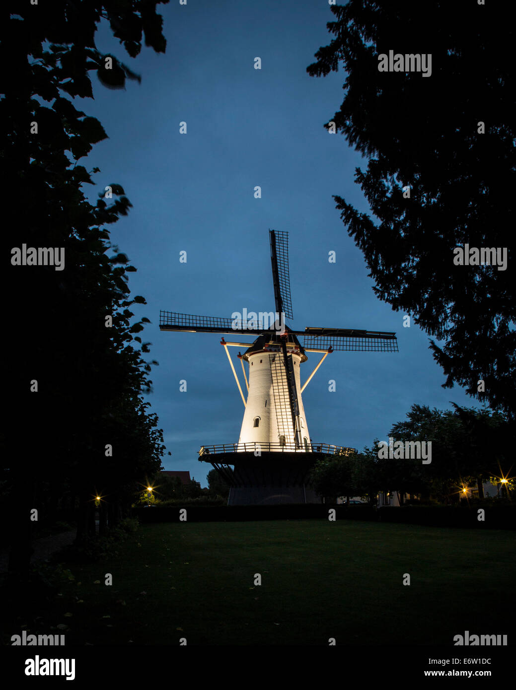 white windmill against dark sky Stock Photo - Alamy