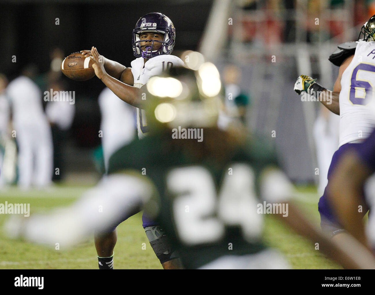 Florida, US. 30th Aug, 2014.Western Carolina quarterback Troy Mitchell ...