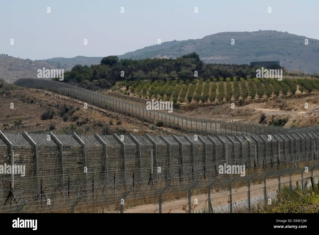 A fence in the Druze village of Majdal Sham divides the Israeli portion ...