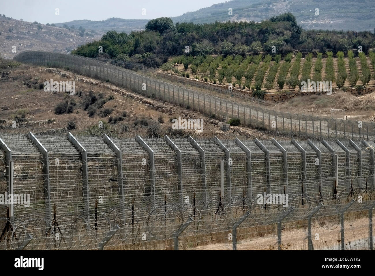 A fence in the Druze village of Majdal Sham divides the Israeli portion ...
