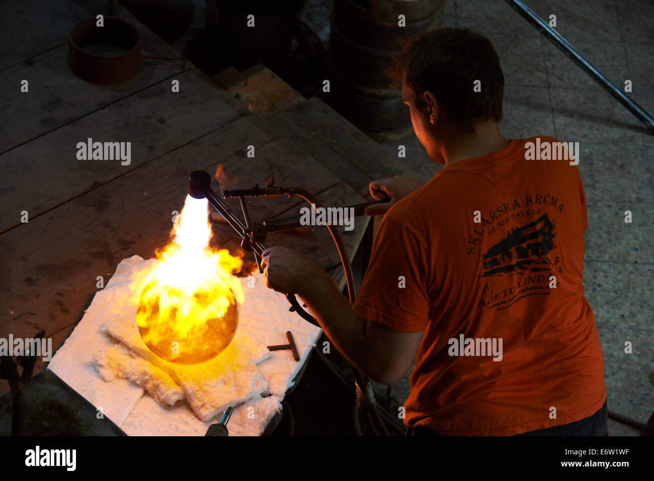 Glassmakers, Glassblowers forming molten glass, glass factory, Ajeto ...