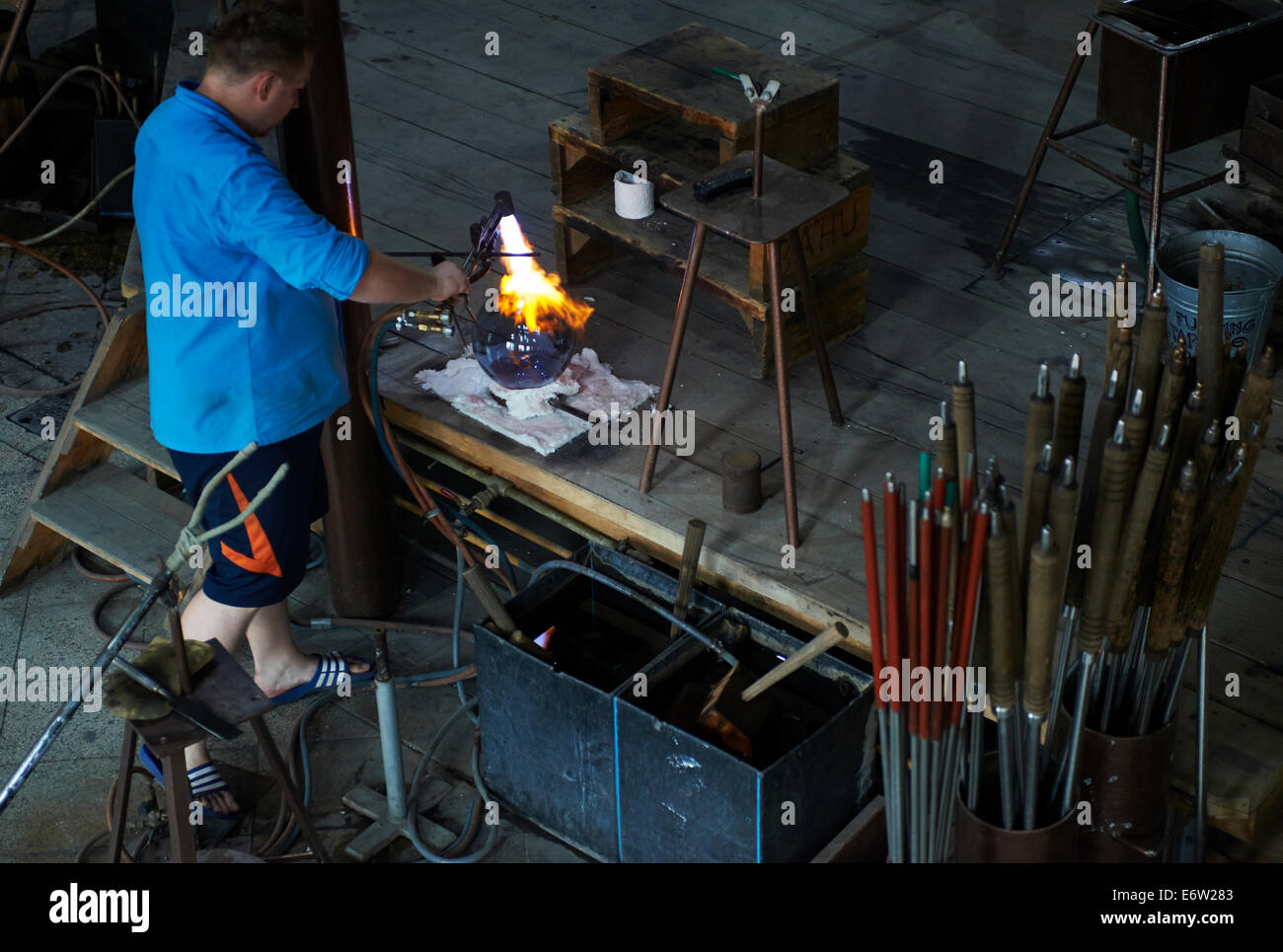 Glassmakers, Glassblowers forming molten glass, glass factory, Ajeto ...