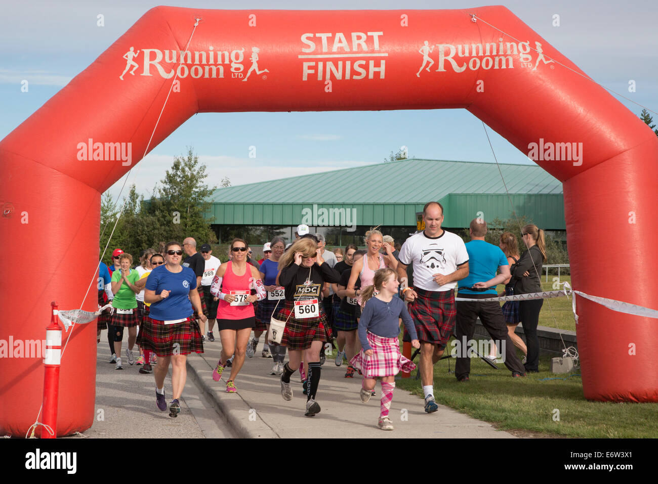 Calgary, Alberta, Canada. 30th Aug, 2014. Participants in kilts start ...