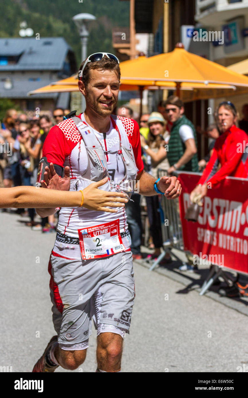 French ultra runner François D'Haene enters Chamonix town centre on his ...