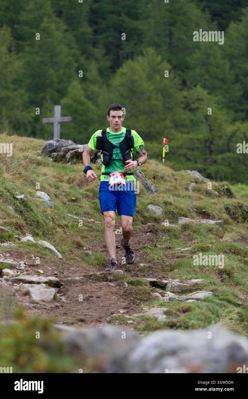 Top Australian finisher Andrew Tuckey passes above the Col de la ...