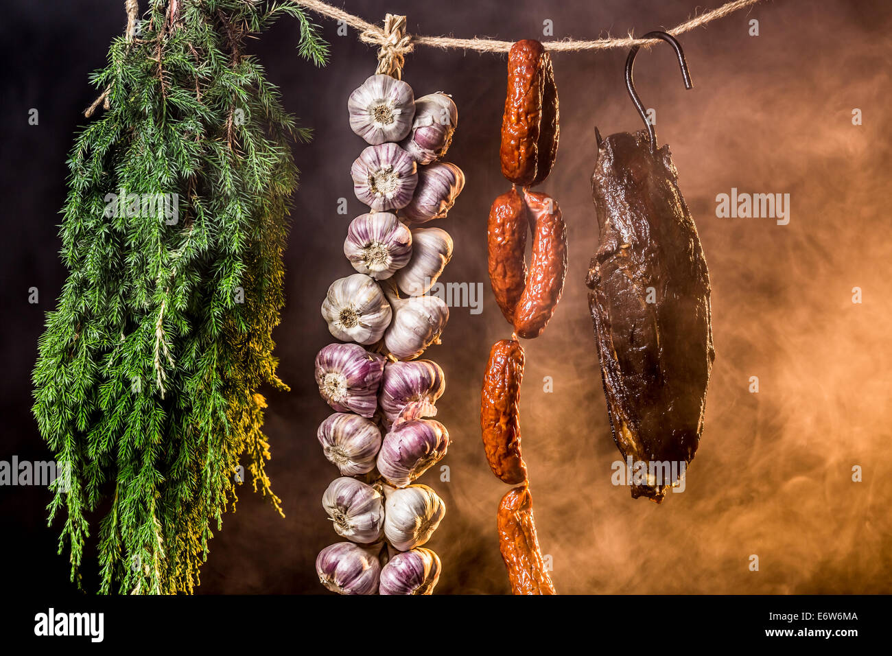 Hanging smoke ham hi-res stock photography and images - Alamy
