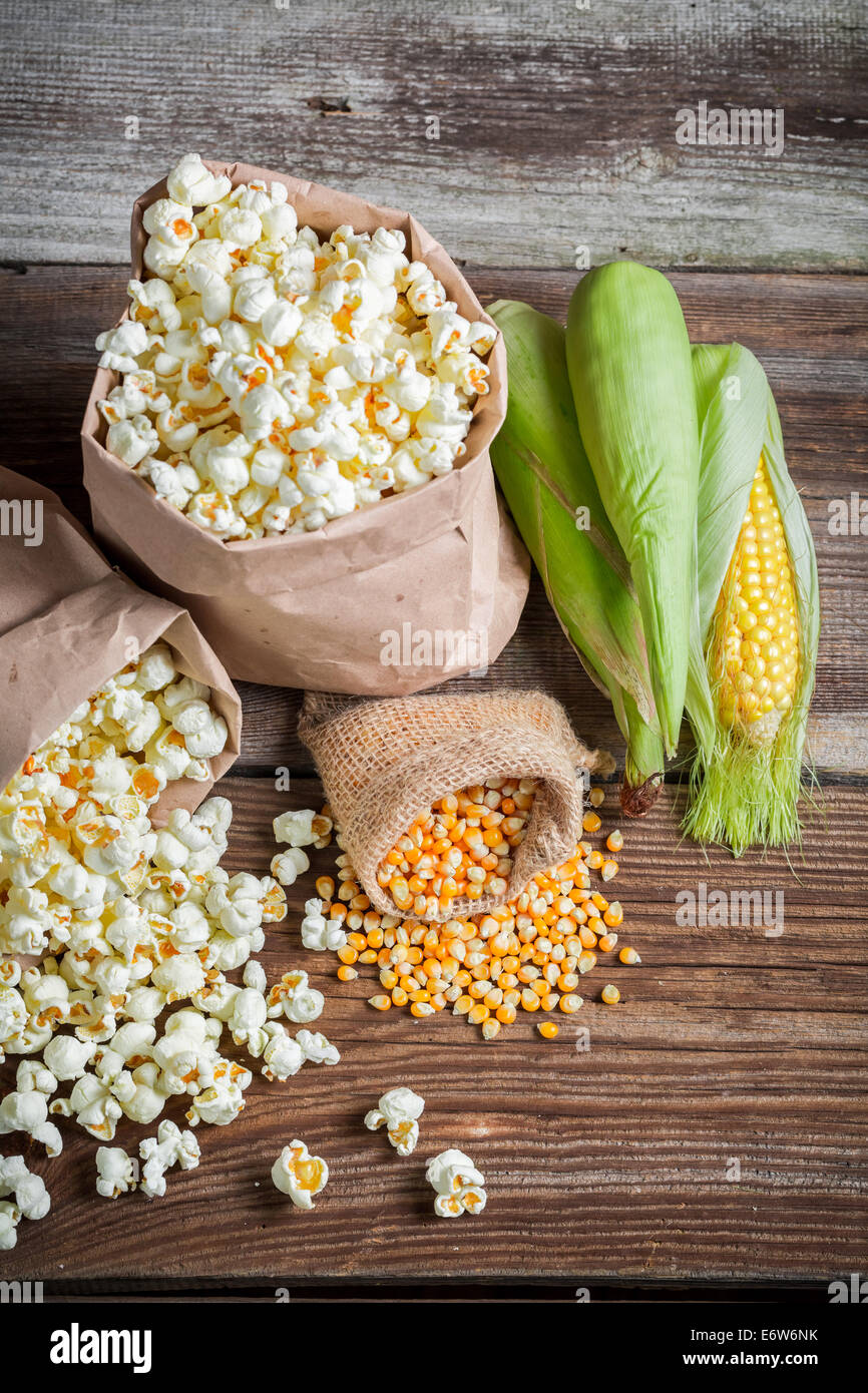 Corn and popcorn in rustic version Stock Photo - Alamy