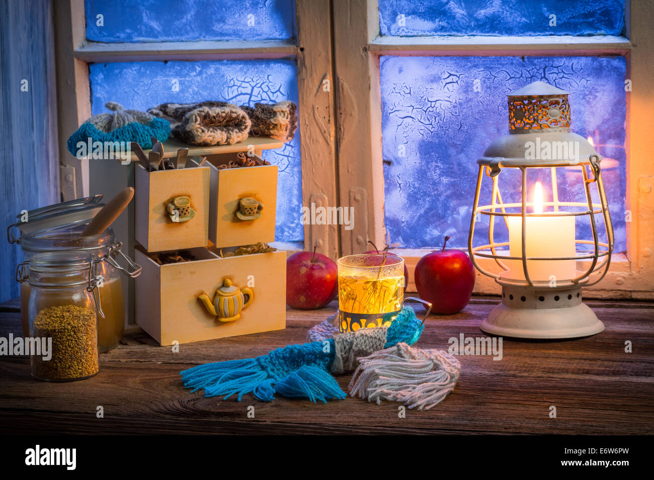 Warming tea in a winter cottage Stock Photo - Alamy