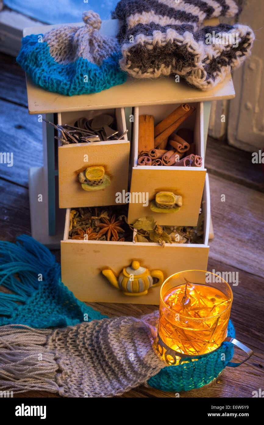 Enjoy your warming tea in winter evening Stock Photo - Alamy