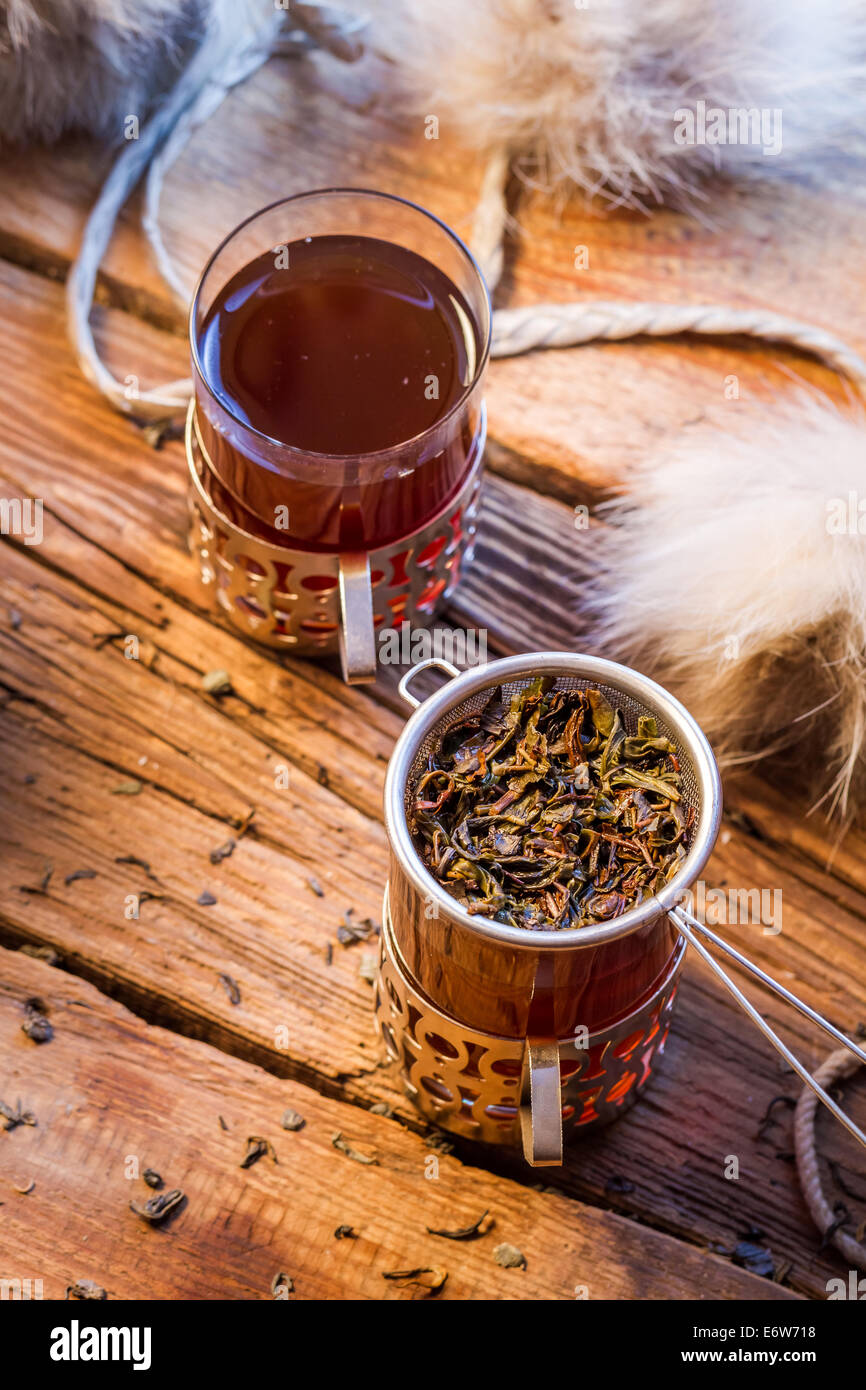 Warming tea served in old-fashioned Stock Photo - Alamy