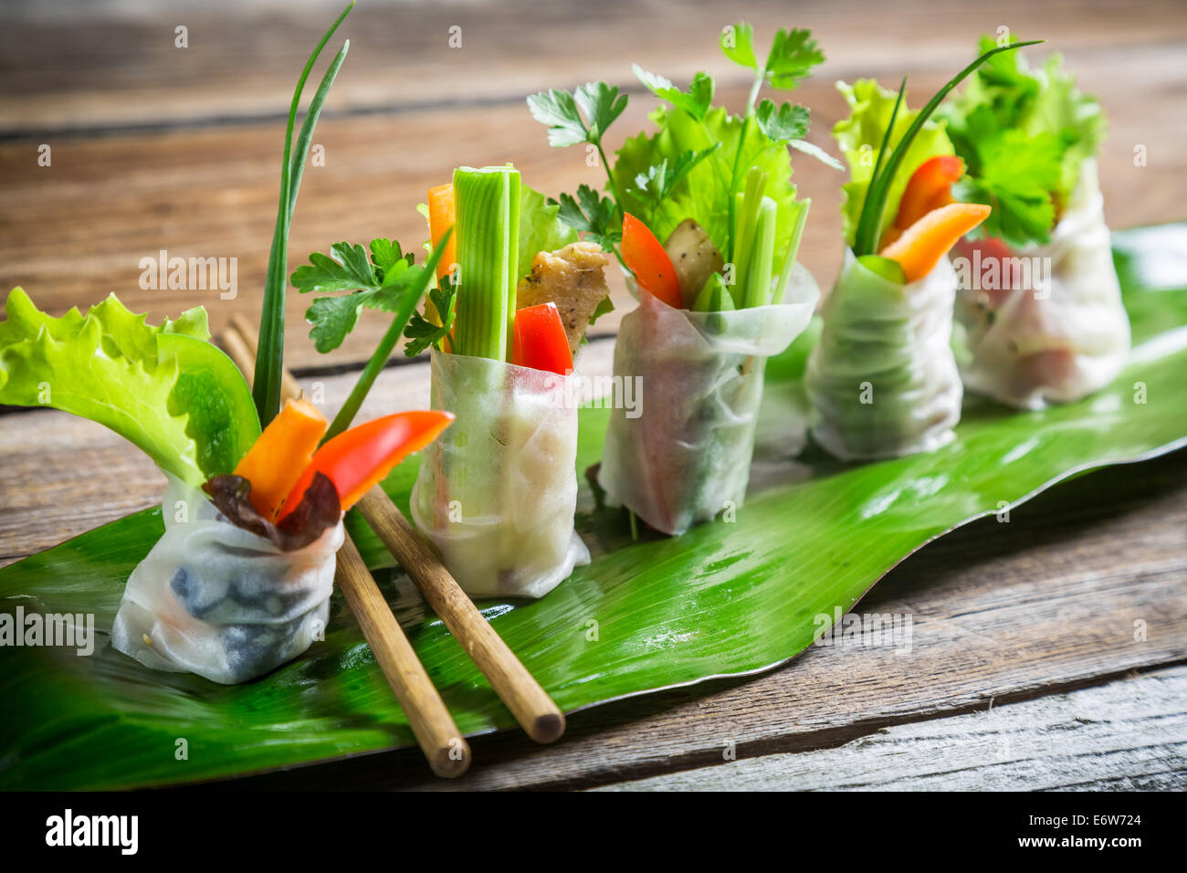 Fresh spring rolls wrapped in rice paper Stock Photo - Alamy