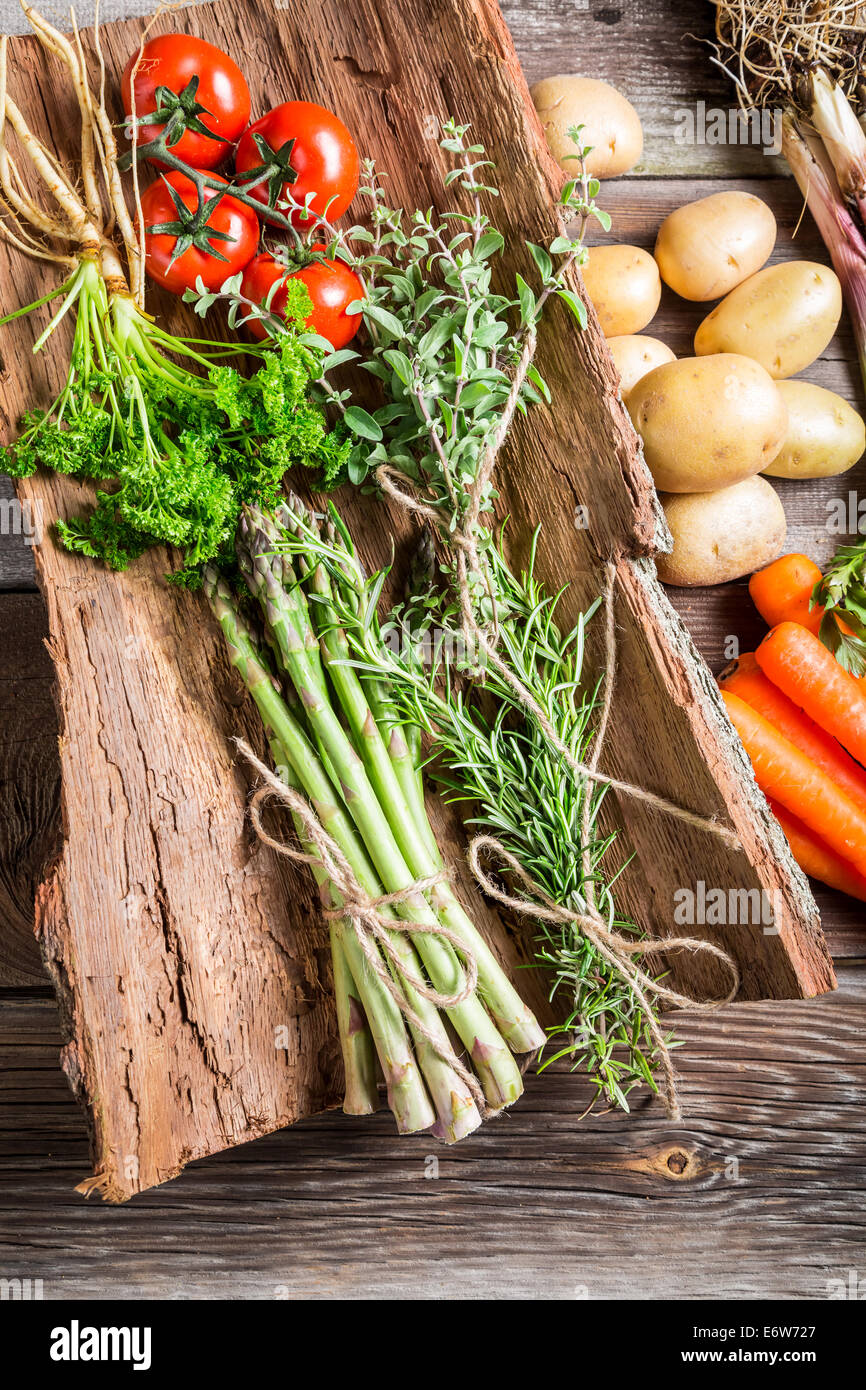 Fresh various vegetables on bark Stock Photo - Alamy