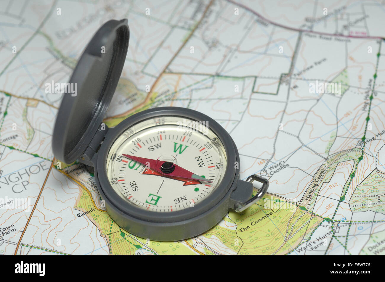Compass on map Stock Photo - Alamy