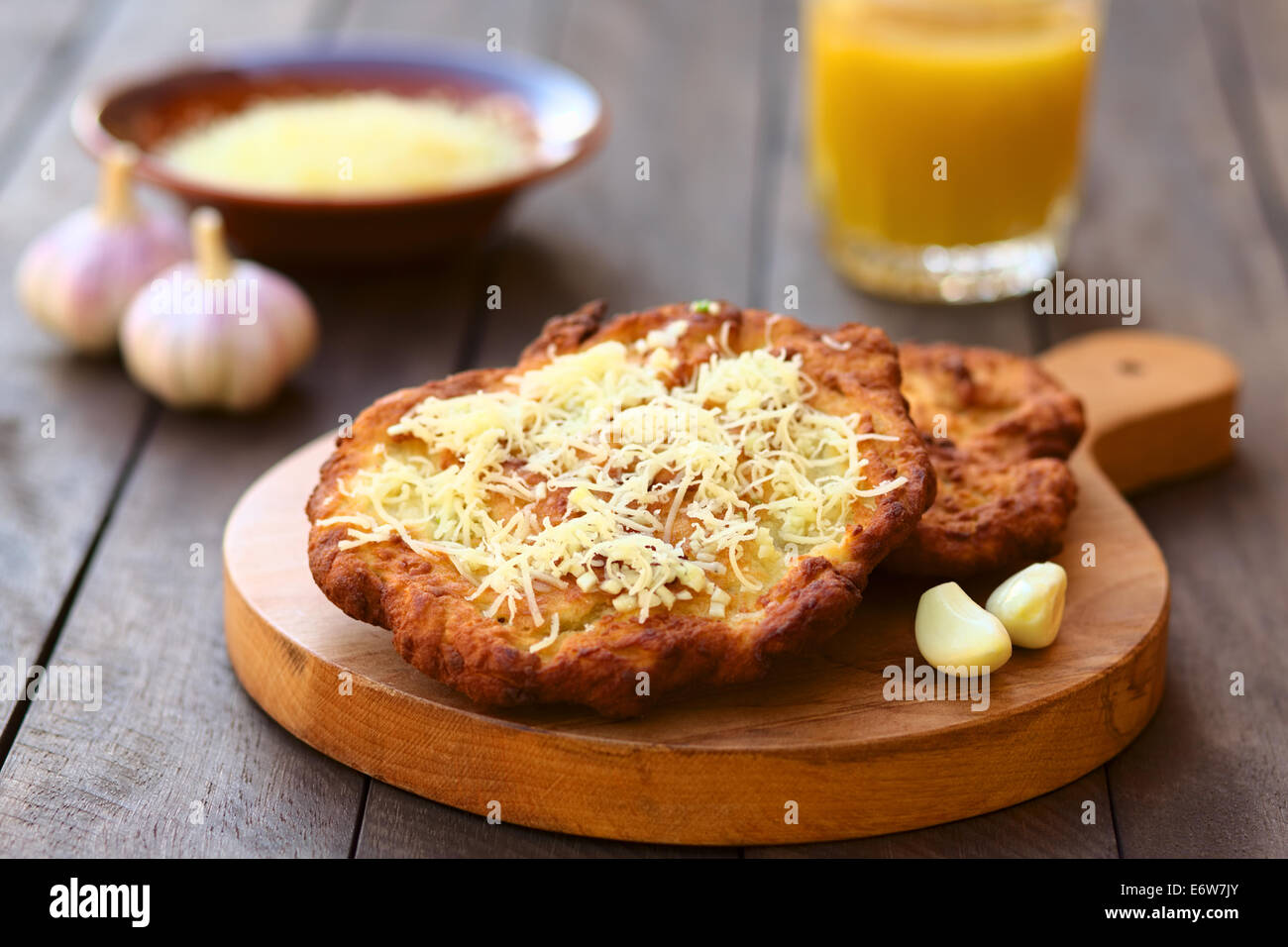Freshly prepared traditional Hungarian deep fried flat bread called ...