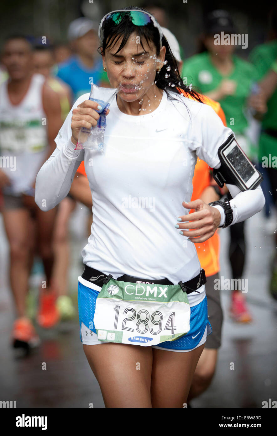 Mexico City, Mexico. 31st Aug, 2014. A runner attends the 32nd edition ...