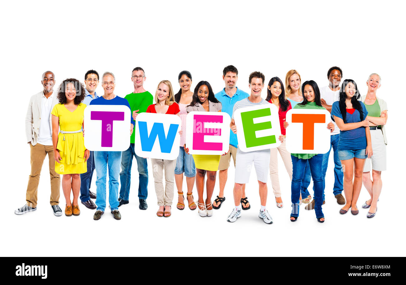 Multiethnic group of people holding placards forming tweet Stock Photo ...