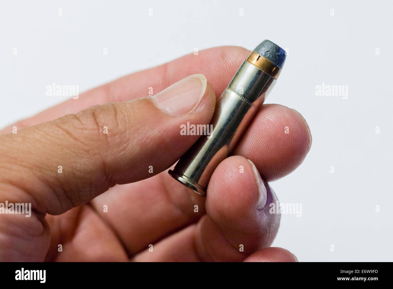 Man holding Winchester 357 magnum hollow point bullet - USA Stock Photo - Alamy