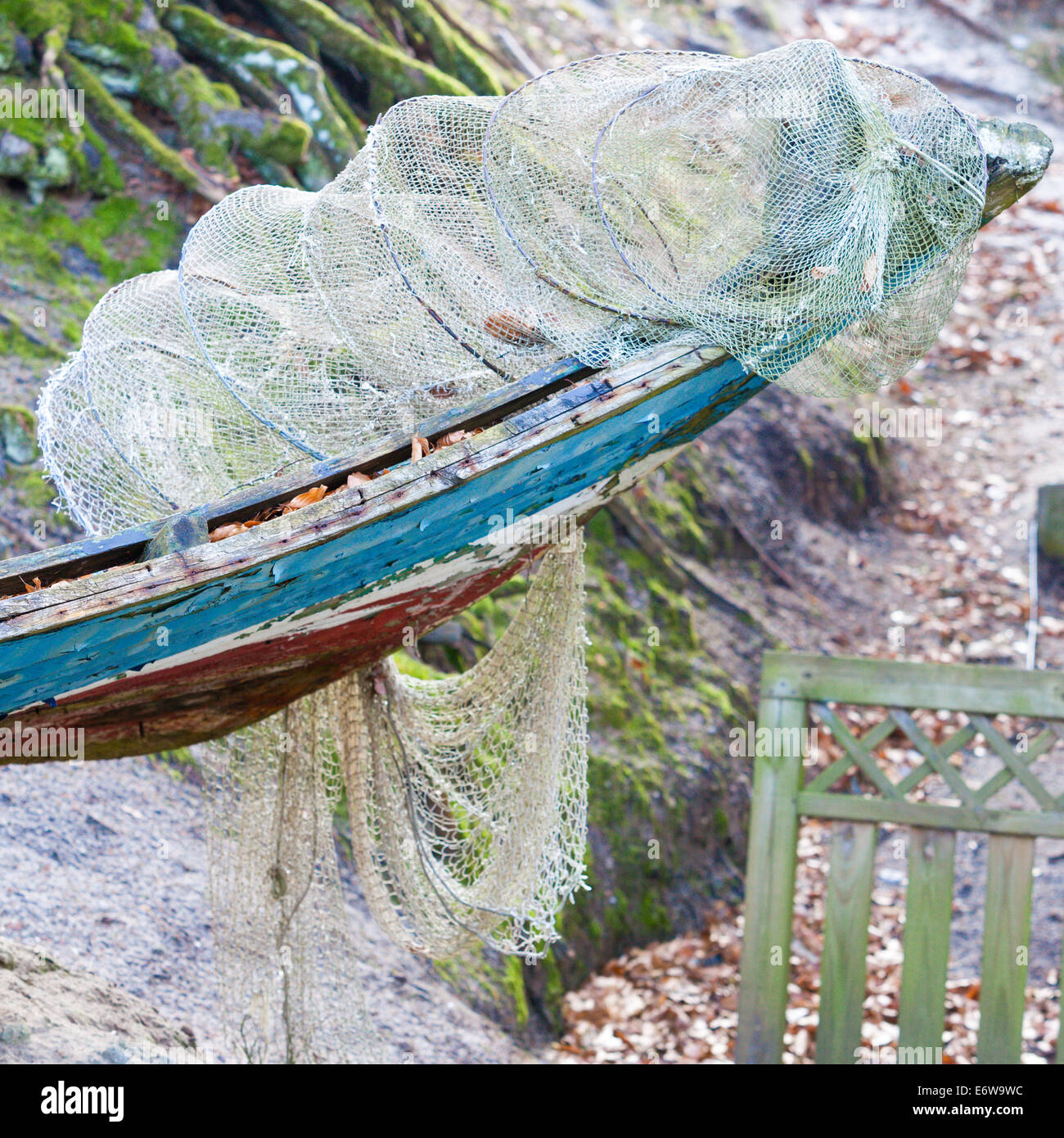 Fishing equipment. Closeup of old net. White fishnet on shore outdoor ...