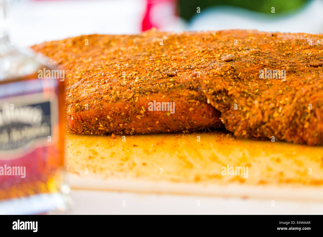 Large slab of meat seasoned ready to be cooked in smoker Stock Photo ...