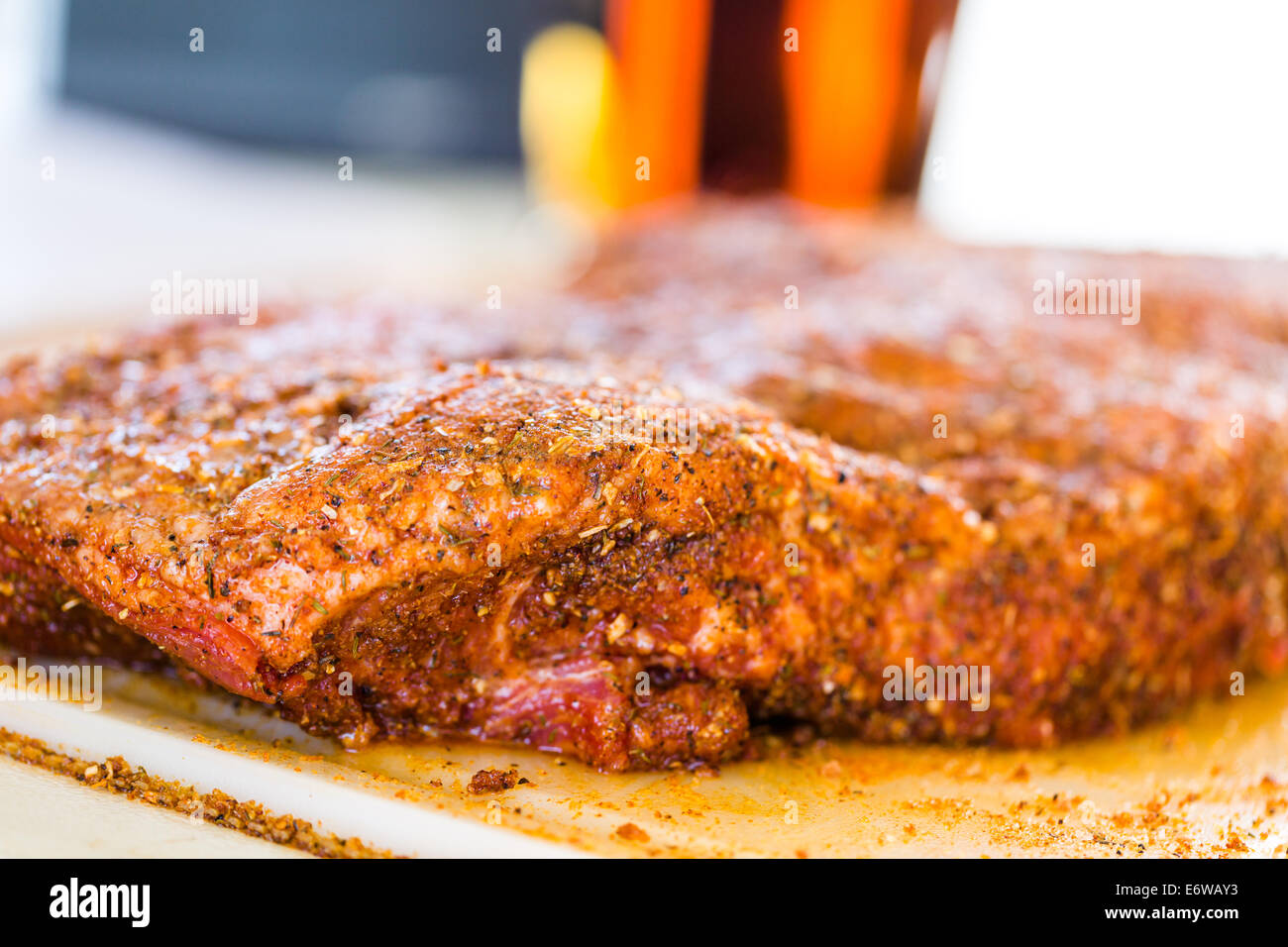 Large slab of meat seasoned ready to be cooked in smoker Stock Photo ...