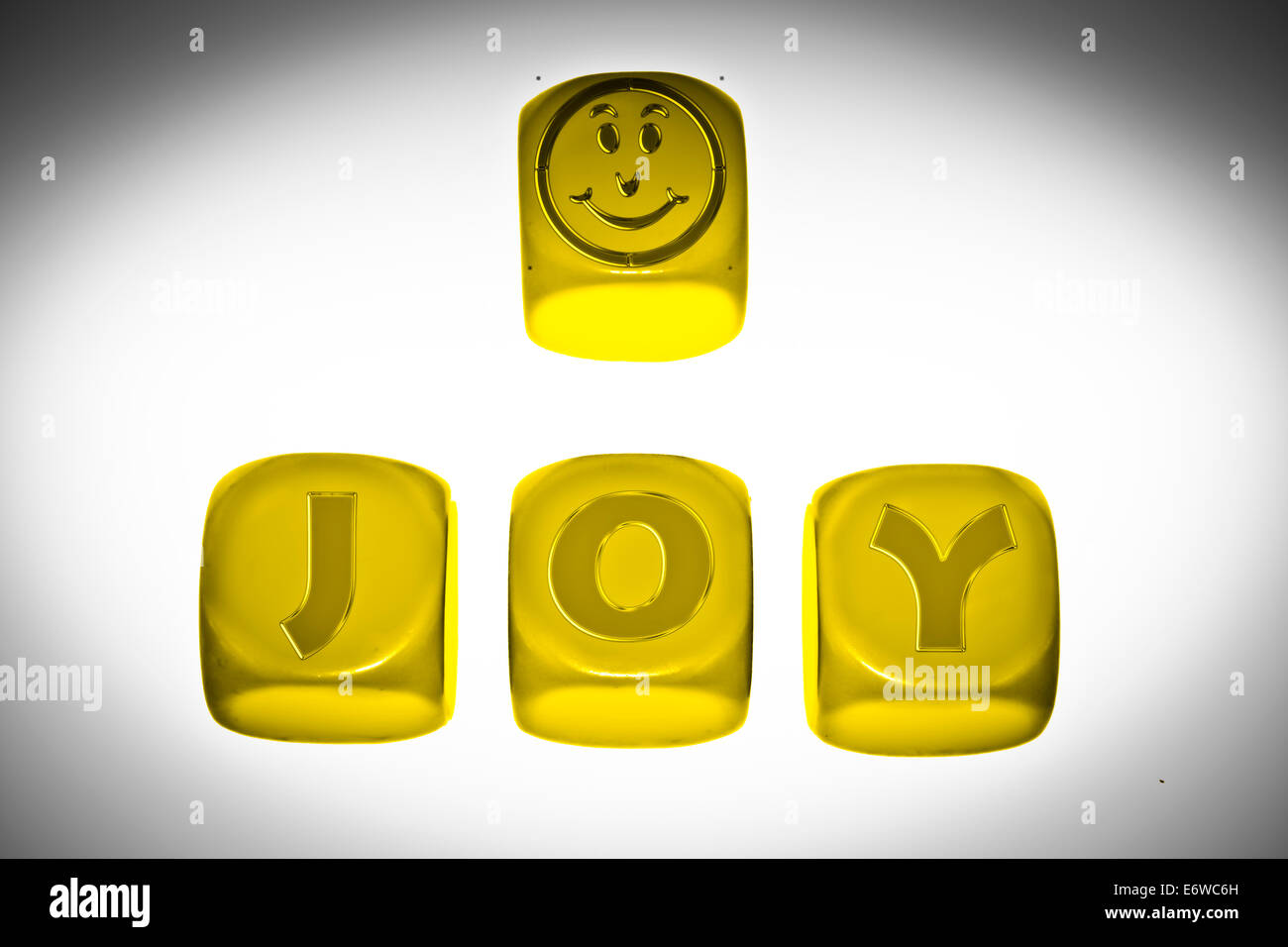 Joy symbol with word JOY on cubes Stock Photo - Alamy