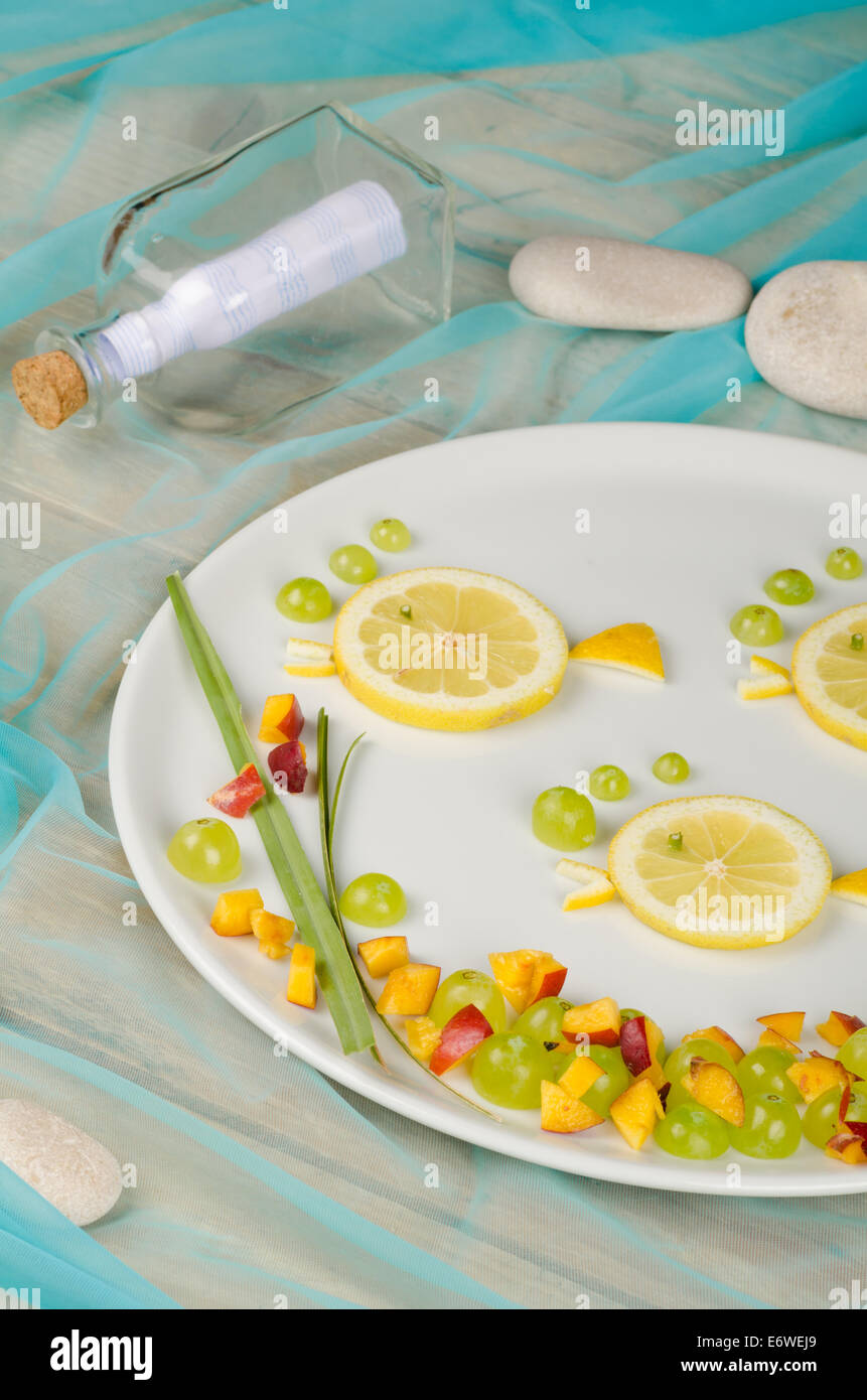 Fruity fish, a creative fruit salad for kids Stock Photo - Alamy