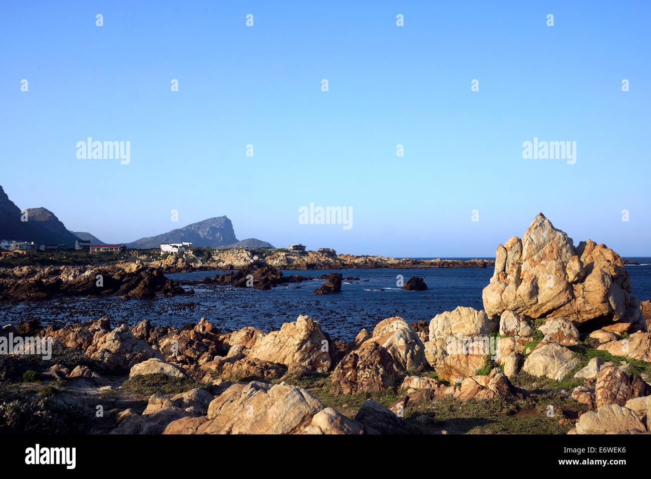The coastal town of Rooi Els(Red Alder) on the eastern shore of False ...