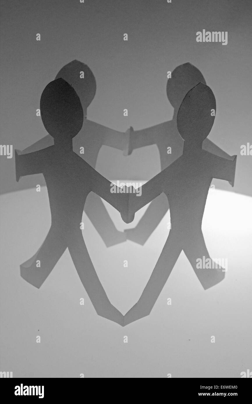 Cut out paper people Black and White Stock Photos & Images - Alamy